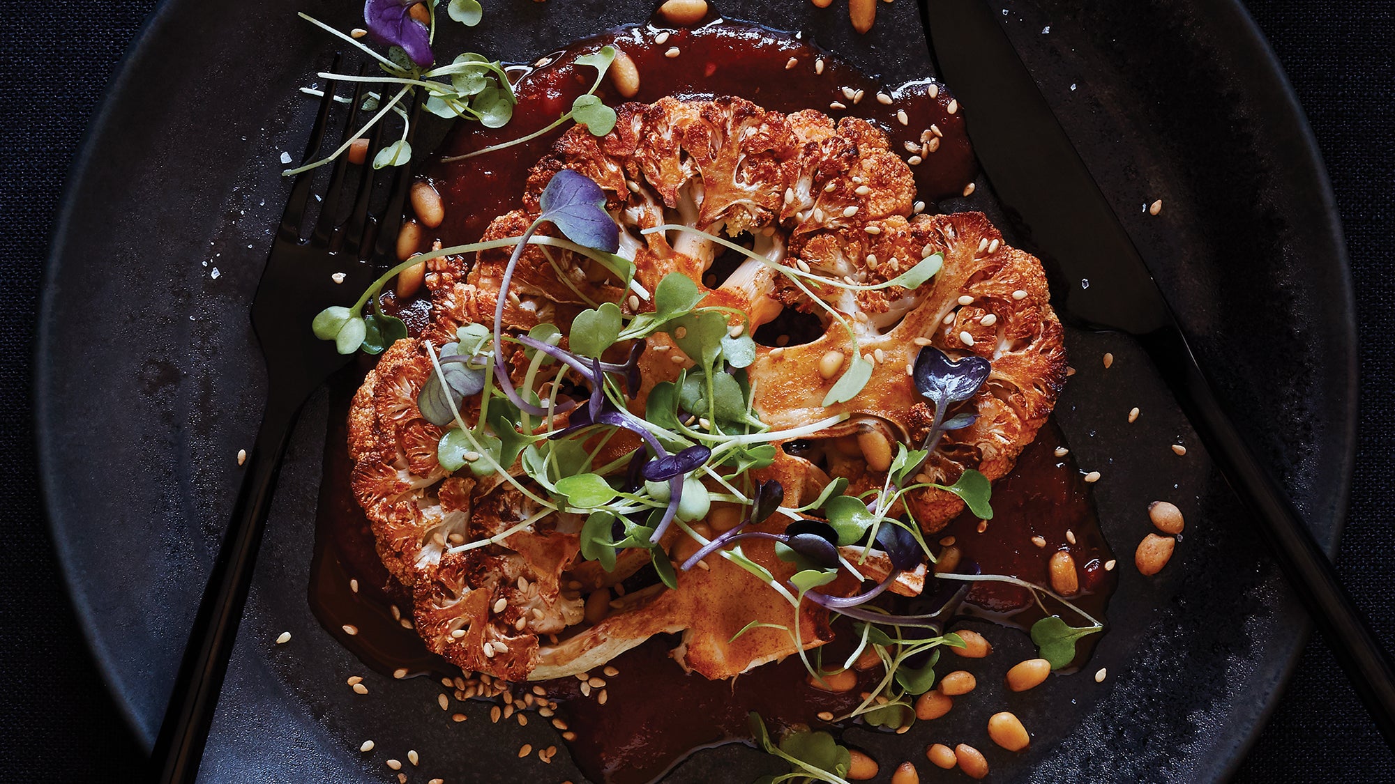 Smoky Cauliflower Steaks with Tomato Sauce & Microgreens